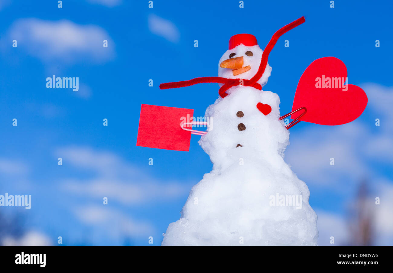 Winter. Funny valentine snowman with paper red heart love symbol for ...