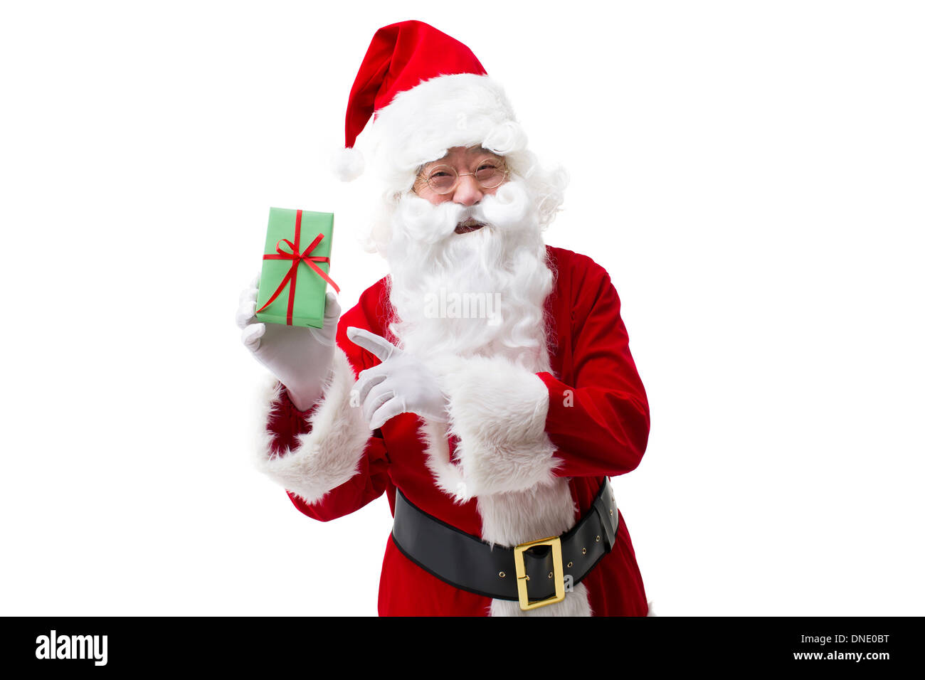 Santa Claus with Christmas gift Stock Photo - Alamy