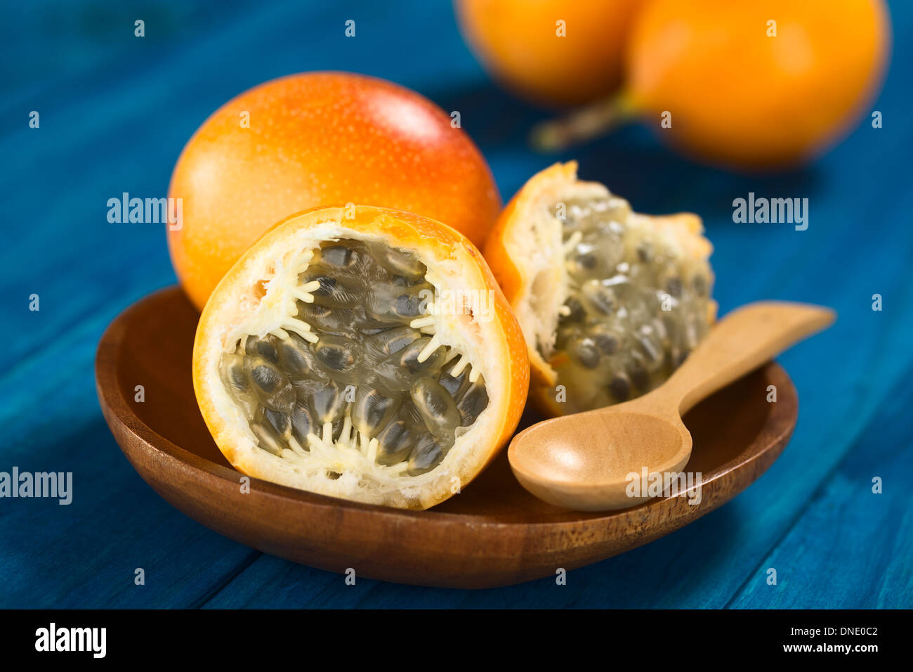 Sweet granadilla or grenadia (lat. Passiflora ligularis) fruit cut in ...