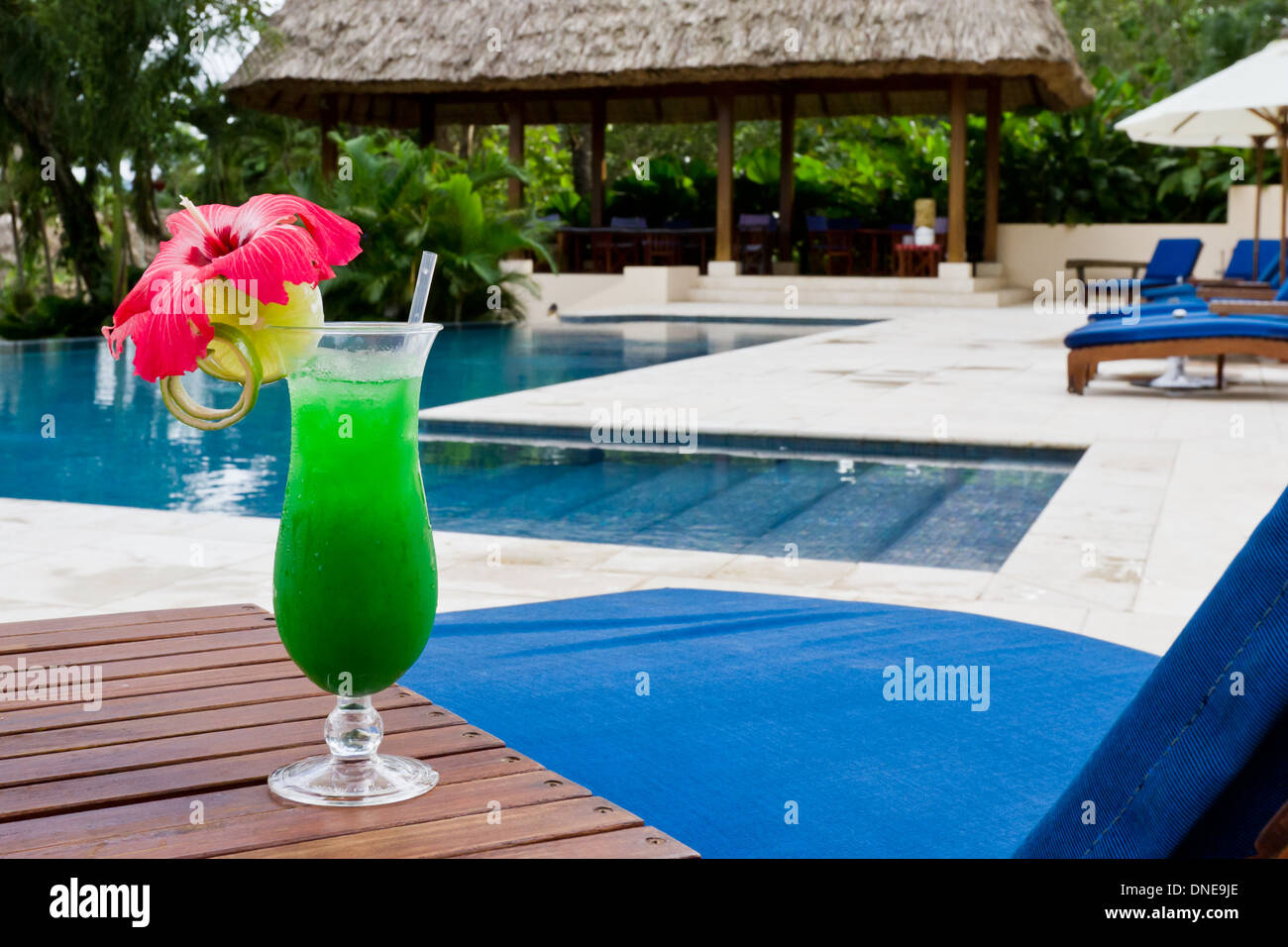 fresh tropical juice cocktail served pool side in Belize Stock Photo ...
