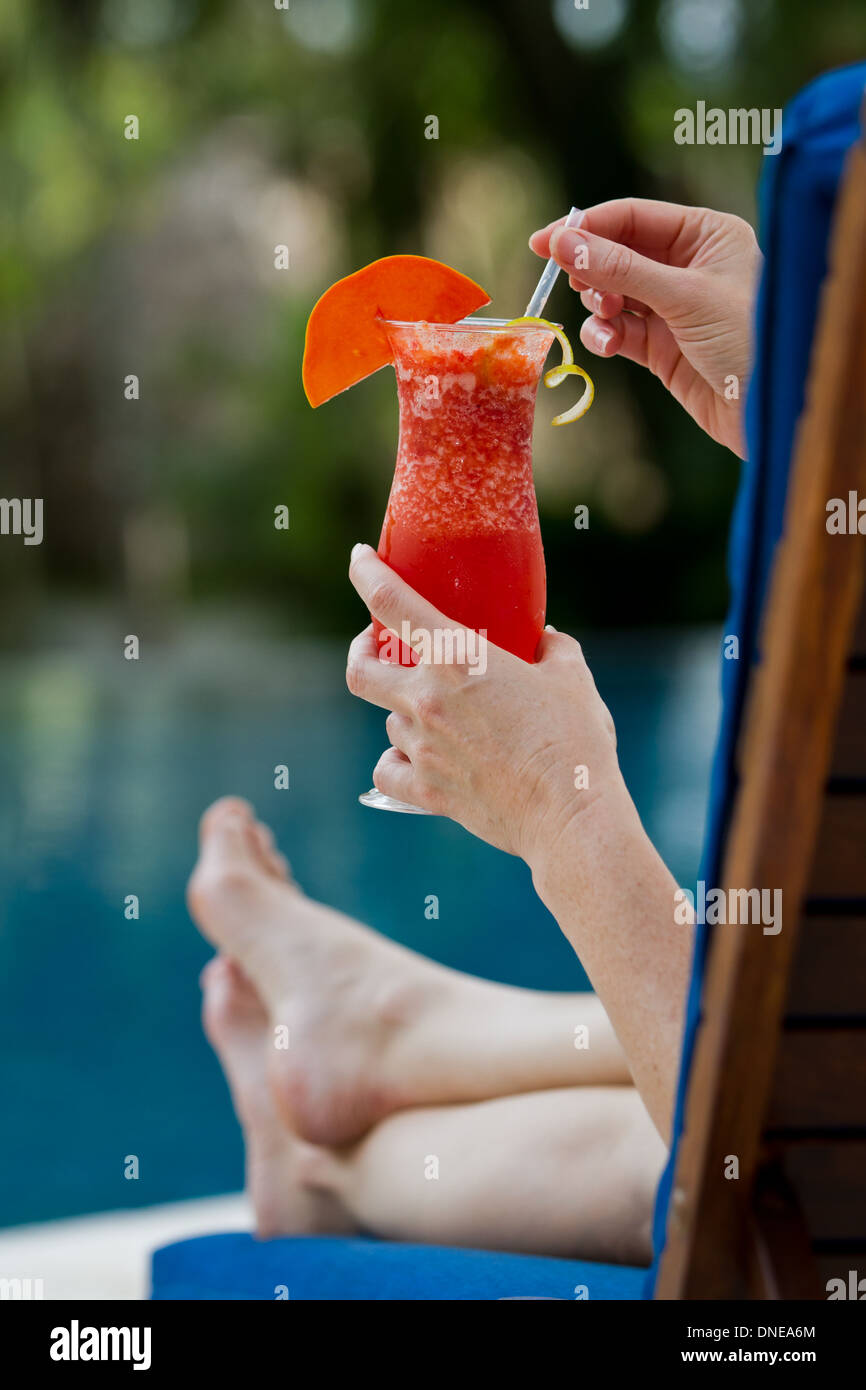 fresh tropical juice cocktail served pool side in Belize Stock Photo ...