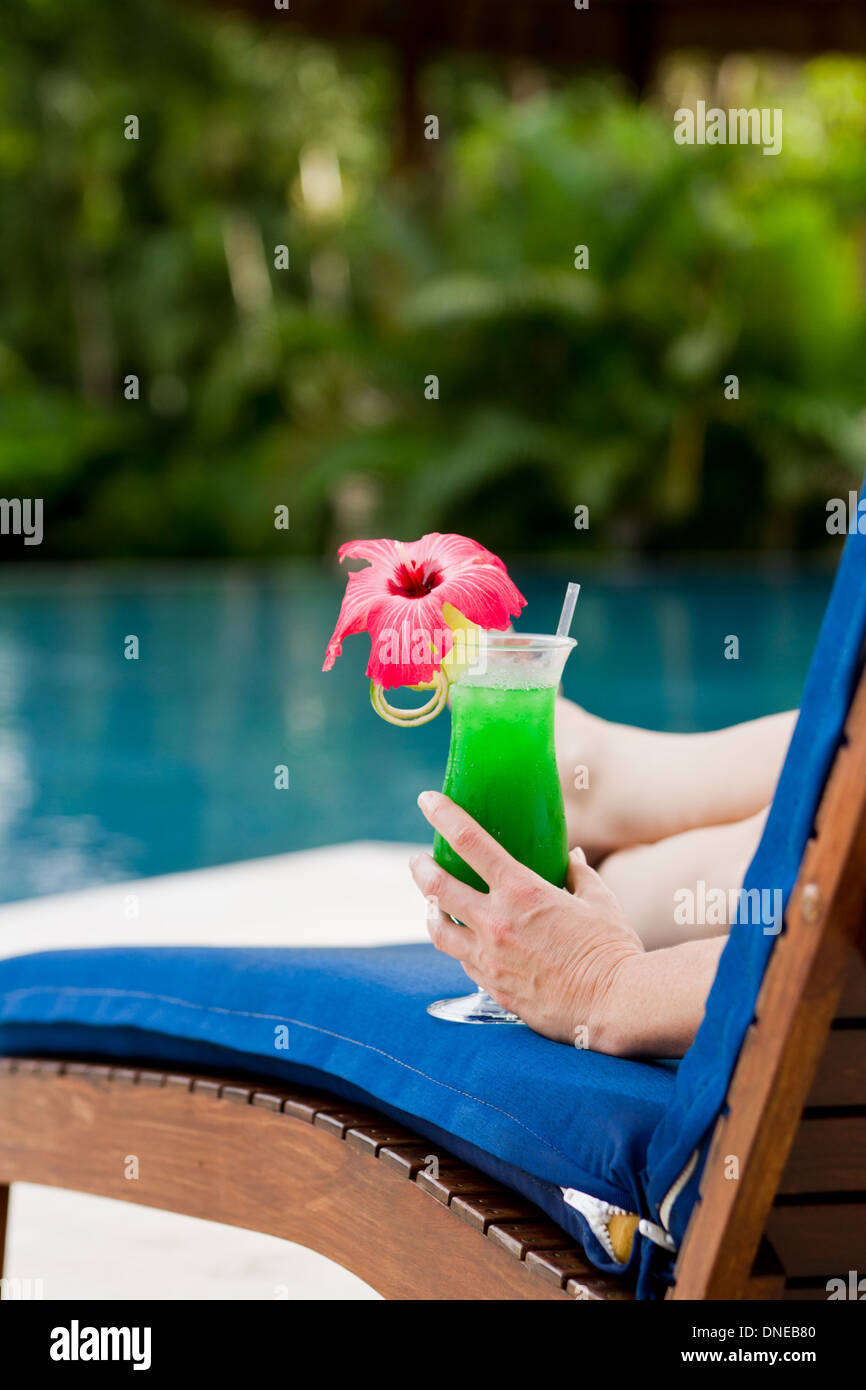 fresh tropical juice cocktail served pool side in Belize Stock Photo ...