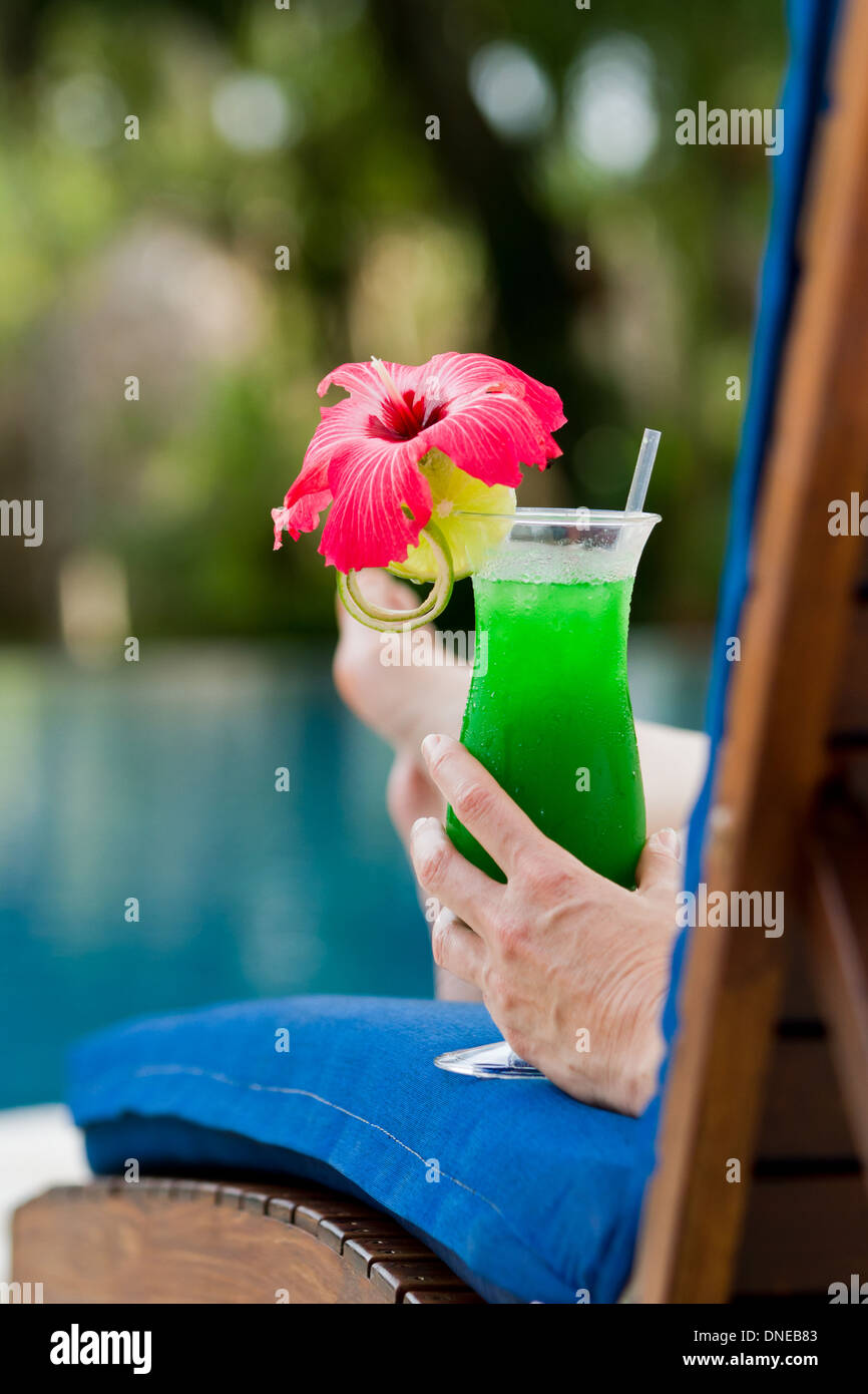 fresh tropical juice cocktail served pool side in Belize Stock Photo ...