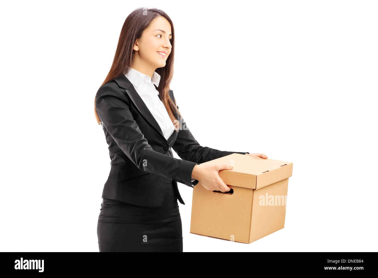 Smiling young businesswoman giving a box to someone Stock Photo - Alamy