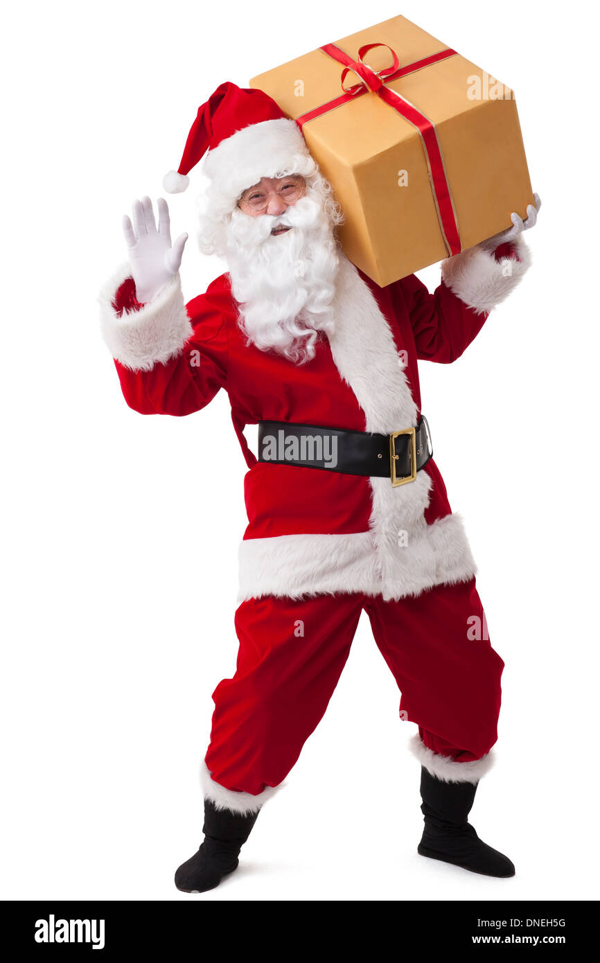 Santa Claus carrying heavy gift box on shoulder Stock Photo - Alamy