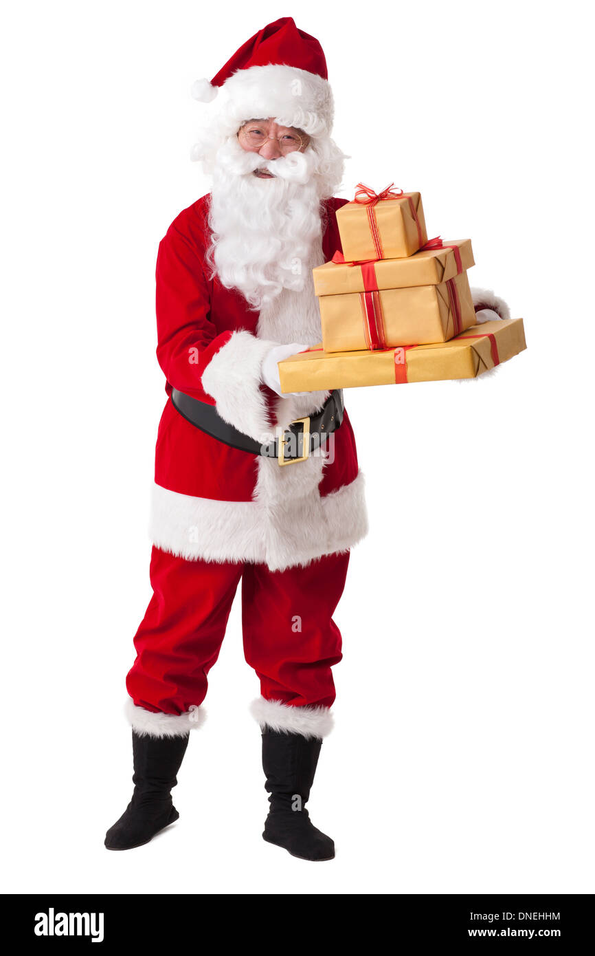 Santa Claus carrying sack of gifts Stock Photo - Alamy