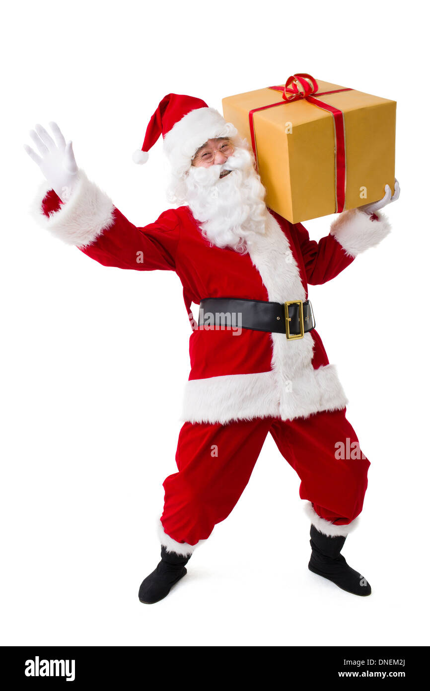Santa claus waving gift Cut Out Stock Images & Pictures - Alamy