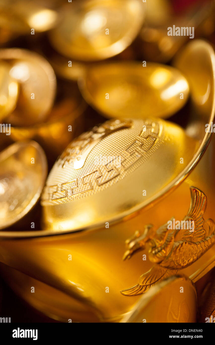 Chinese traditional currency gold yuanbao ingots Stock Photo - Alamy