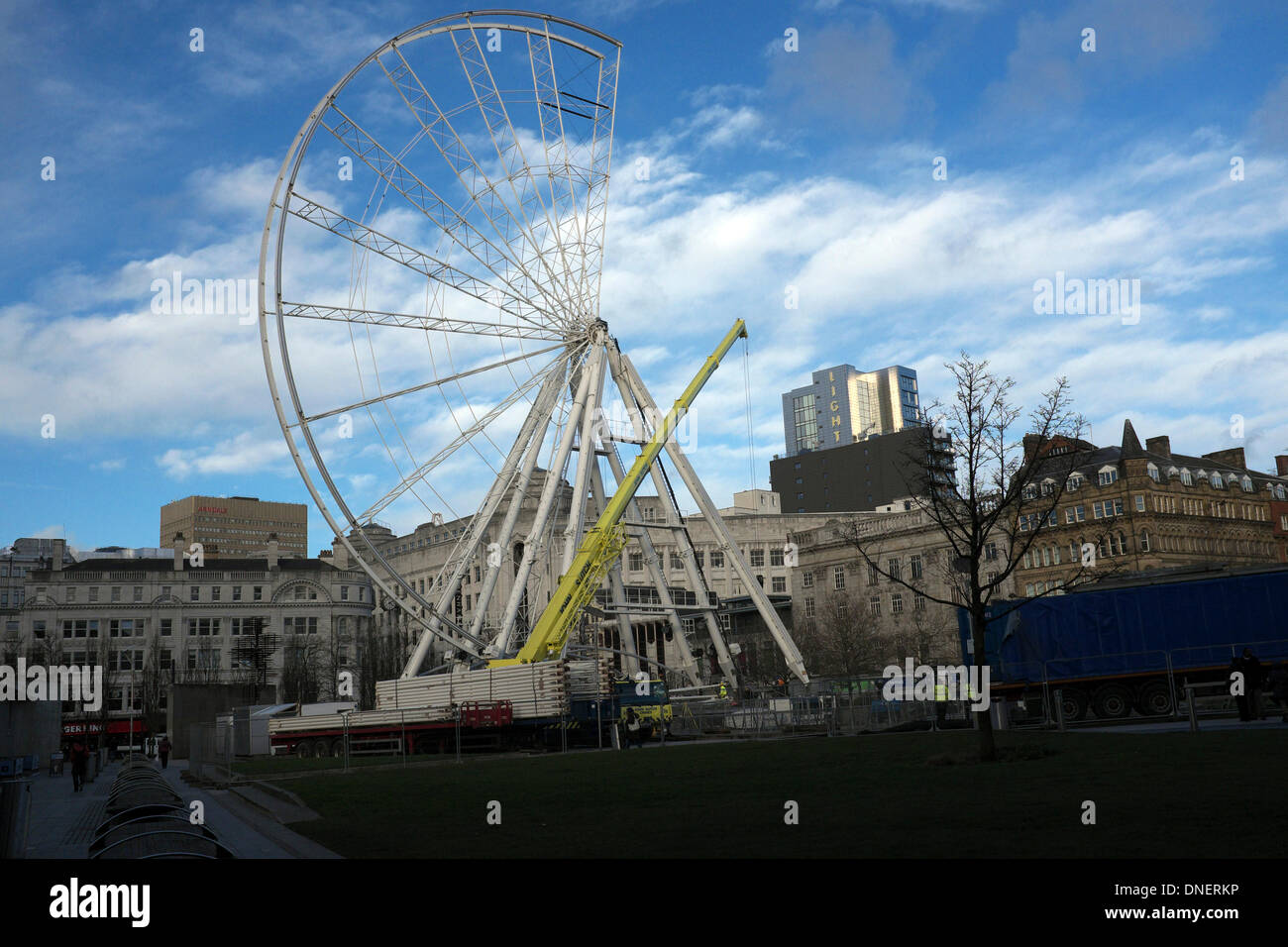 Manchester, UK. 24th December 2013. A giant wheel is being erected in ...