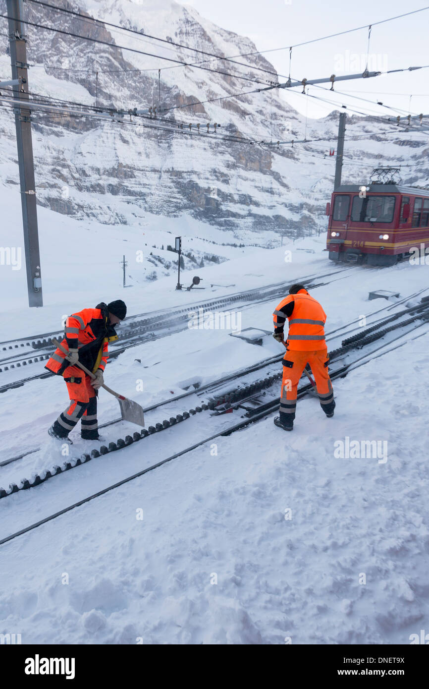 workers clearing the line on the Jungfraubahn Railway, Kleine Scheidegg ...