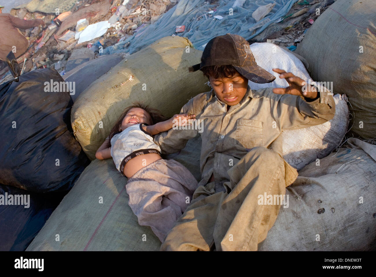 Children playing in garbage dump hi-res stock photography and images ...