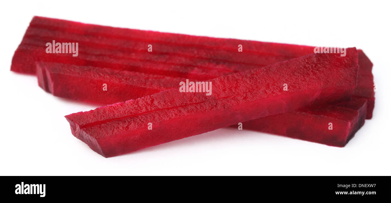 Closeup of sliced red beet over white background Stock Photo - Alamy