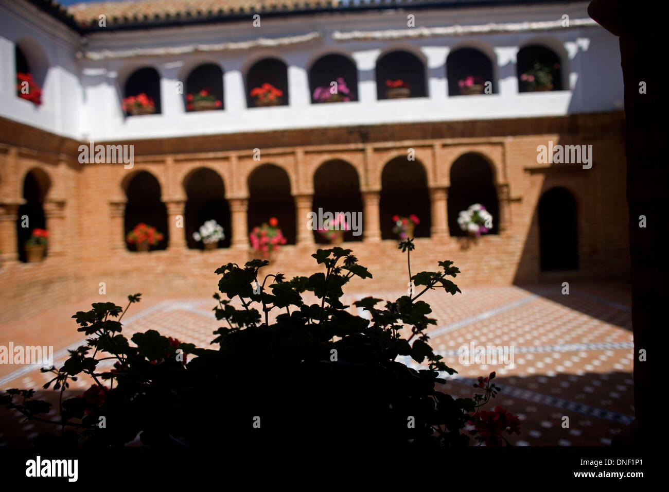 Flower pots decorate the cloister of La Rabida Monastery in Palos de la ...