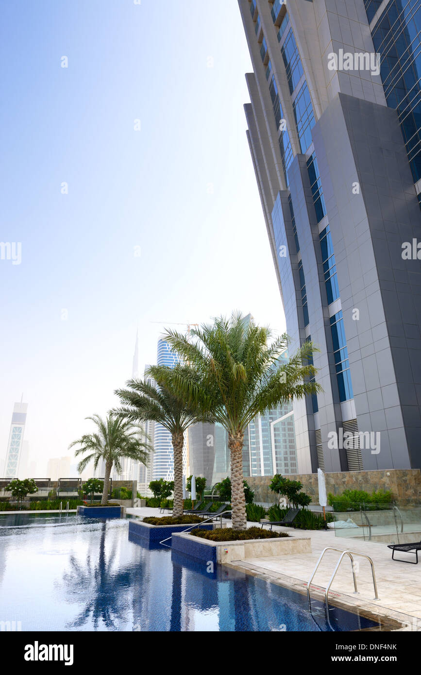 The swimming pool near skyscraper, Dubai, UAE Stock Photo - Alamy