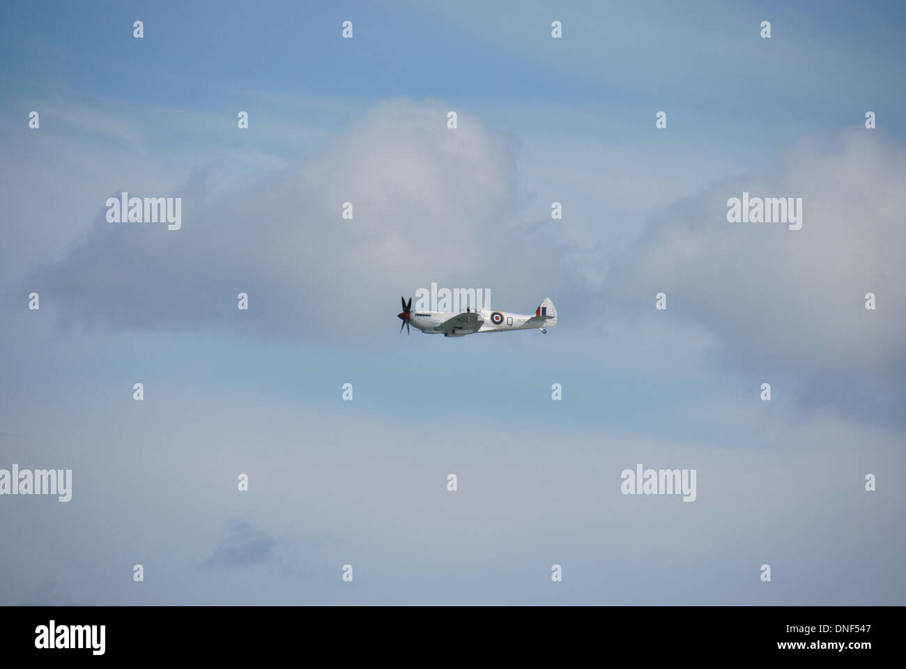 Spitfire in clouds hi-res stock photography and images - Alamy