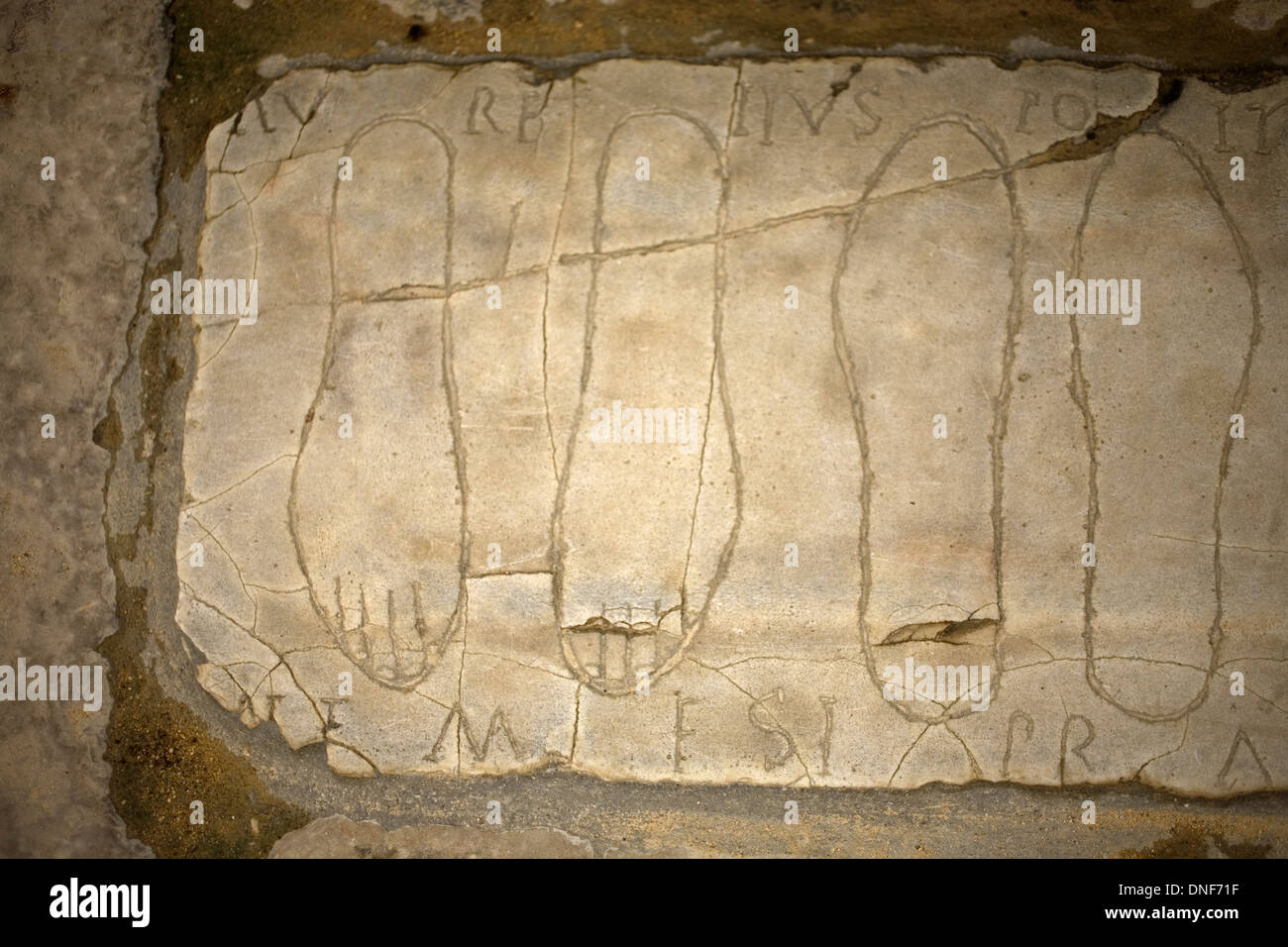 Foot shapes carved in a stone in honor to Nemesis and Dea Caelestis ...