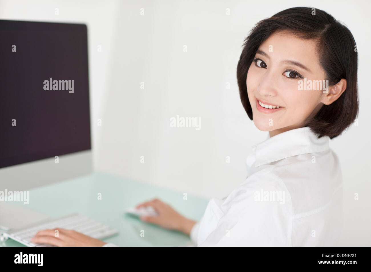 Young office lady at work Stock Photo - Alamy