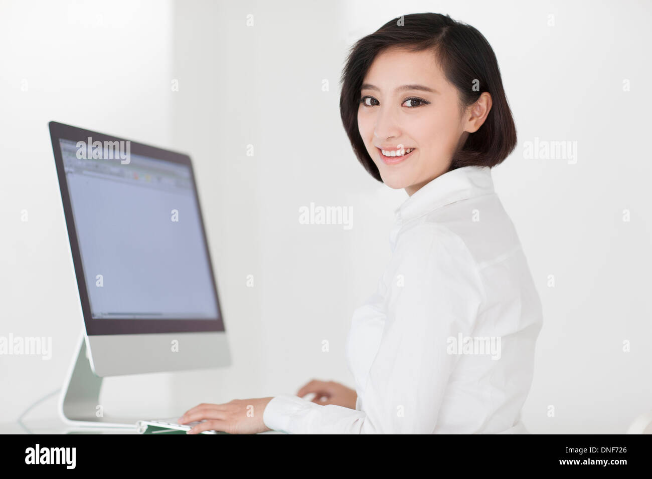 Young office lady at work Stock Photo - Alamy