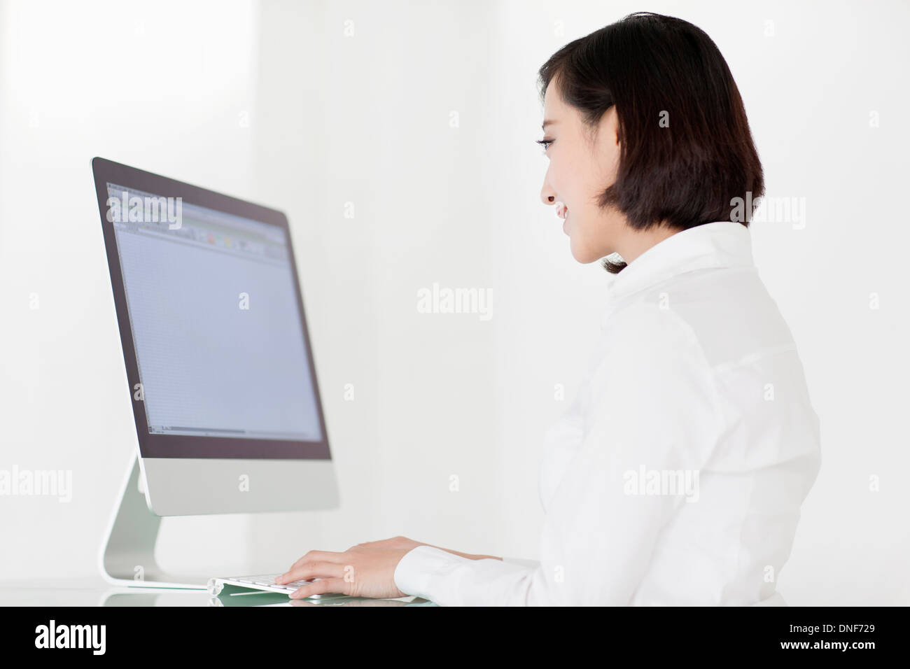 Young office lady at work Stock Photo - Alamy