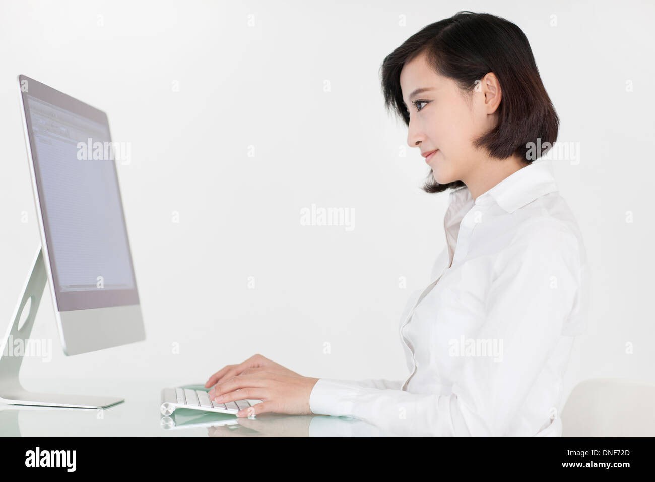 Young office lady at work Stock Photo - Alamy