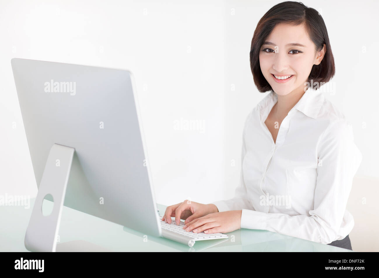 Young office lady at work Stock Photo - Alamy