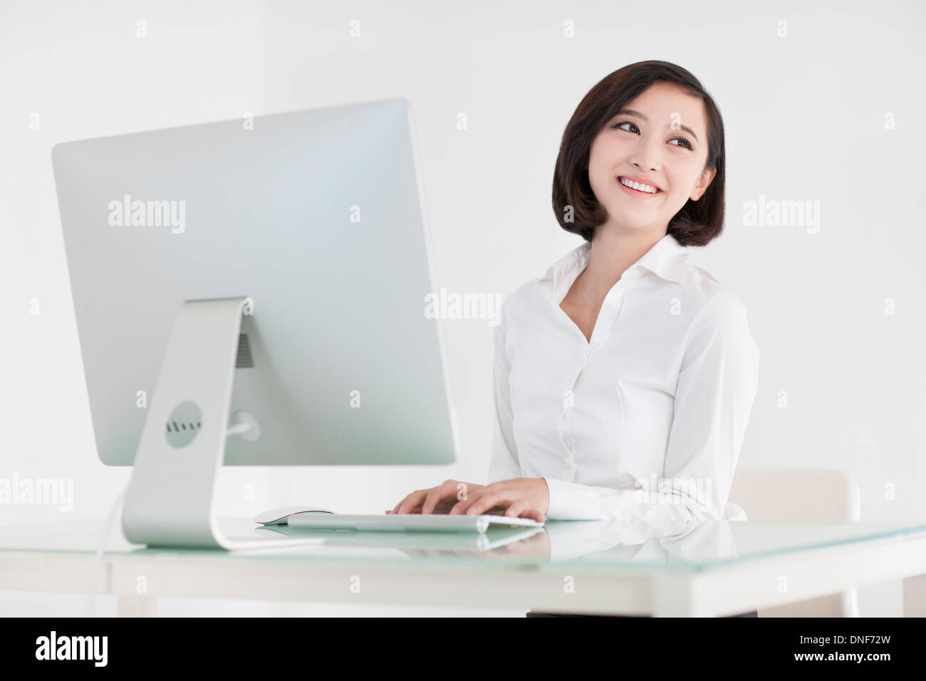Young office lady at work Stock Photo - Alamy