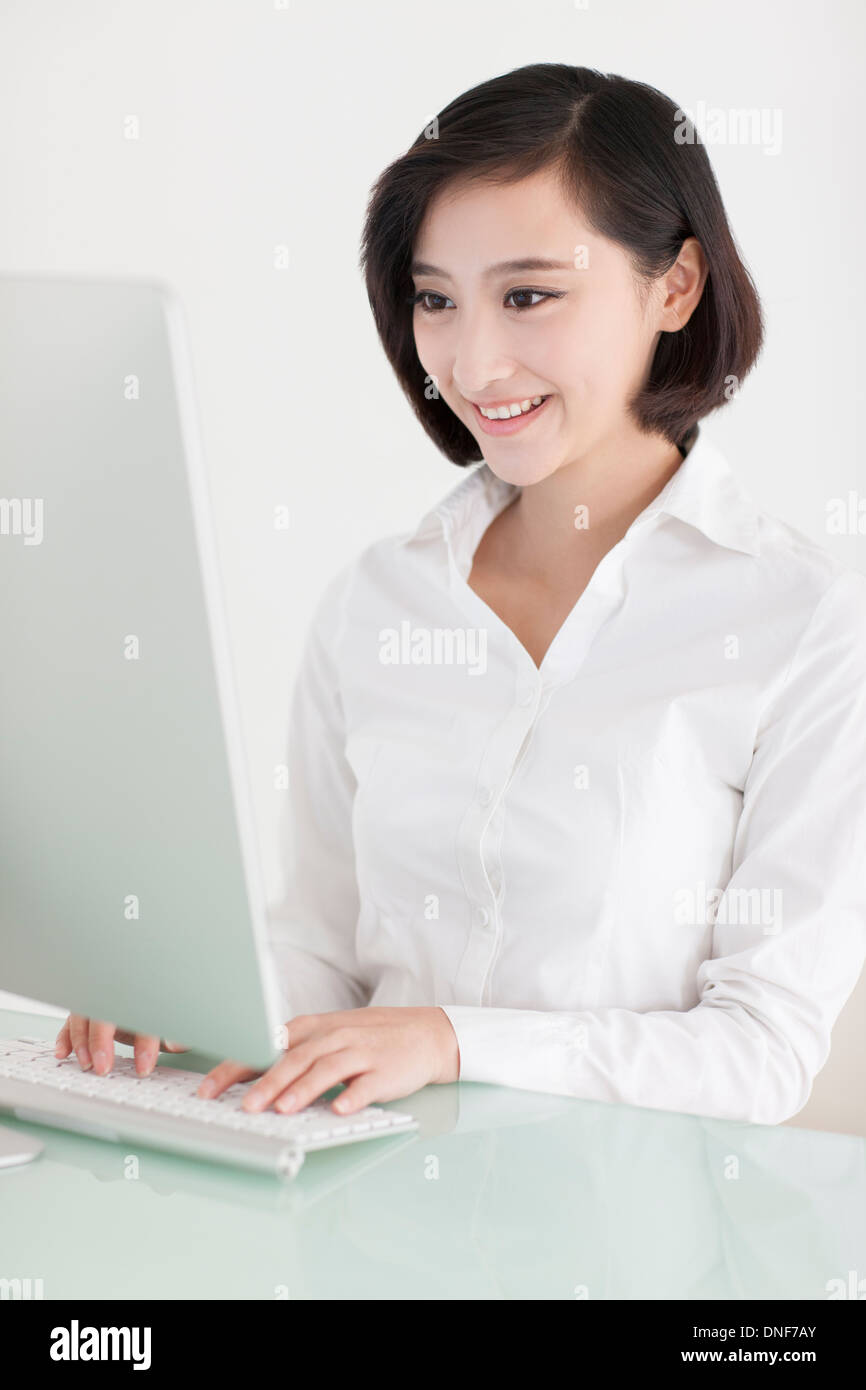 Young office lady at work Stock Photo - Alamy