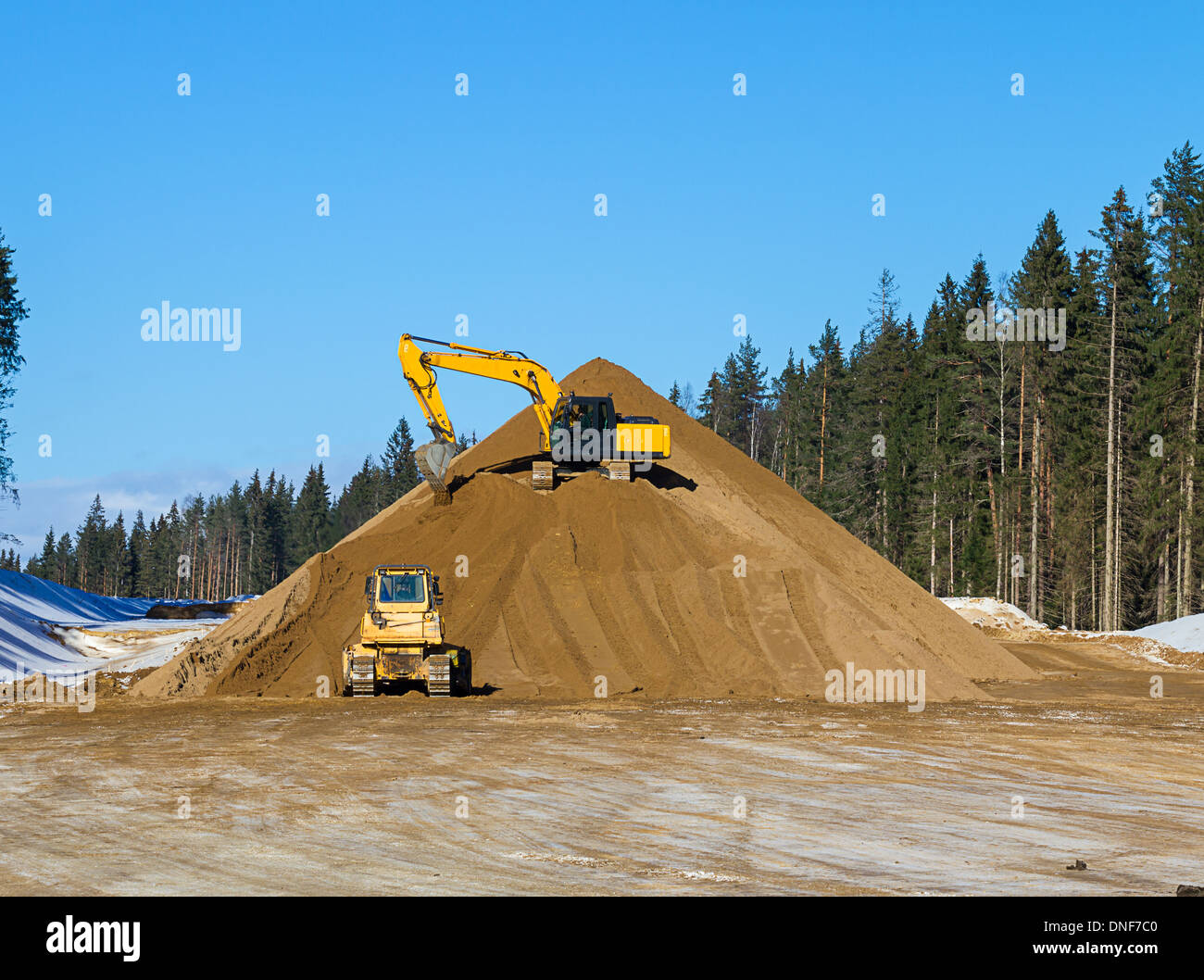Yellow construction transport Stock Photo - Alamy