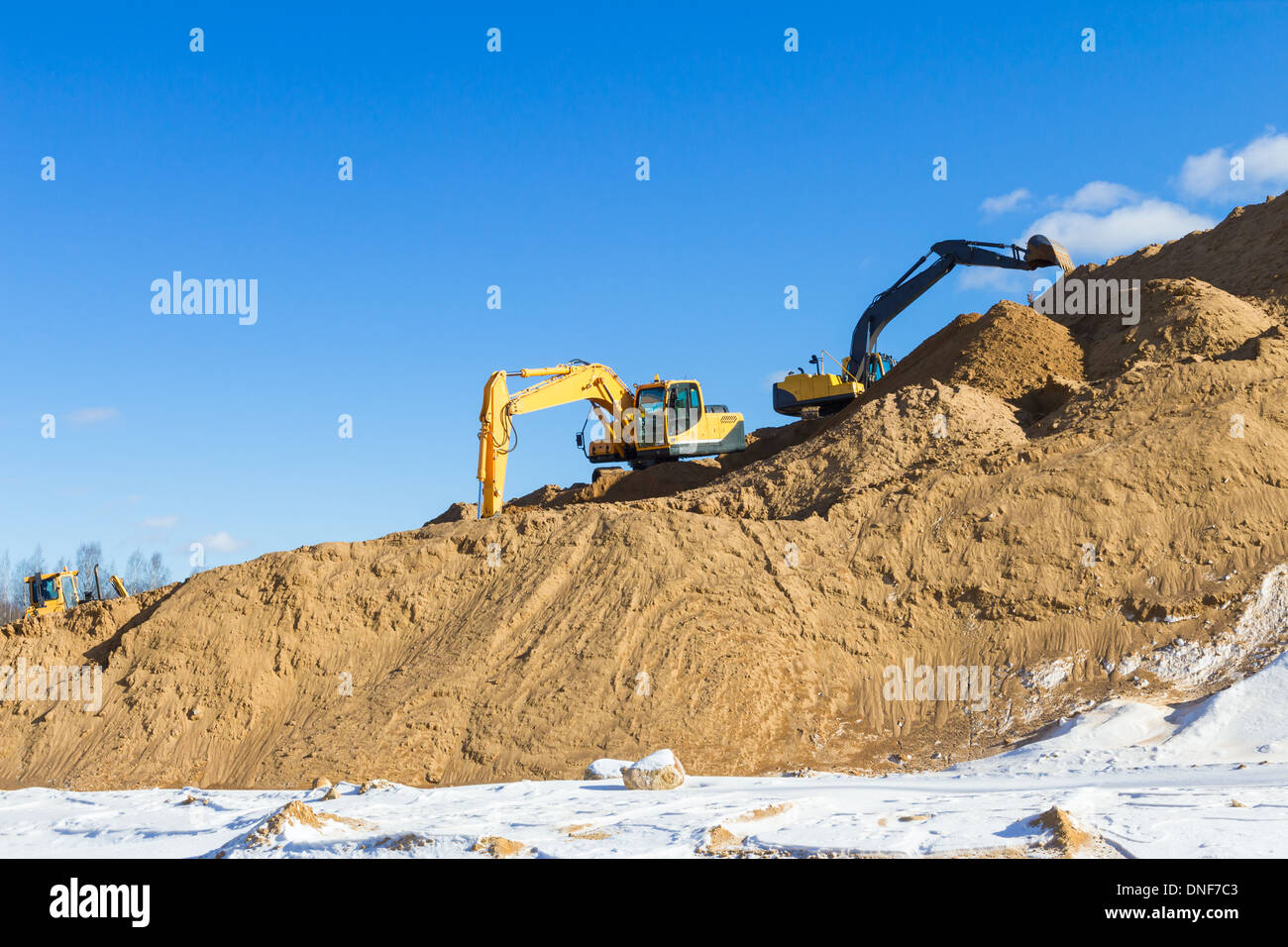 Yellow construction transport Stock Photo - Alamy