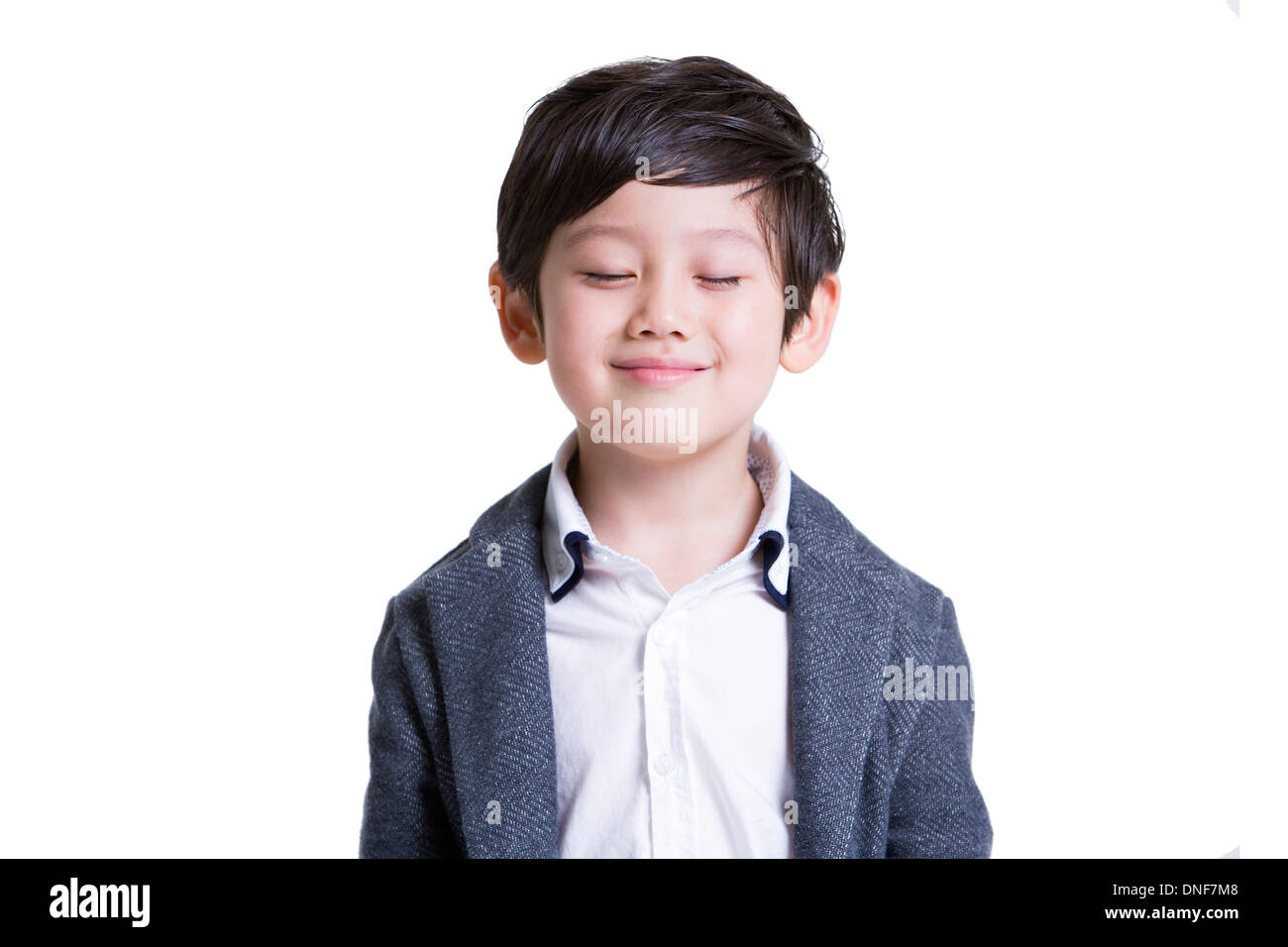 Cute little boy with eyes closed Stock Photo - Alamy