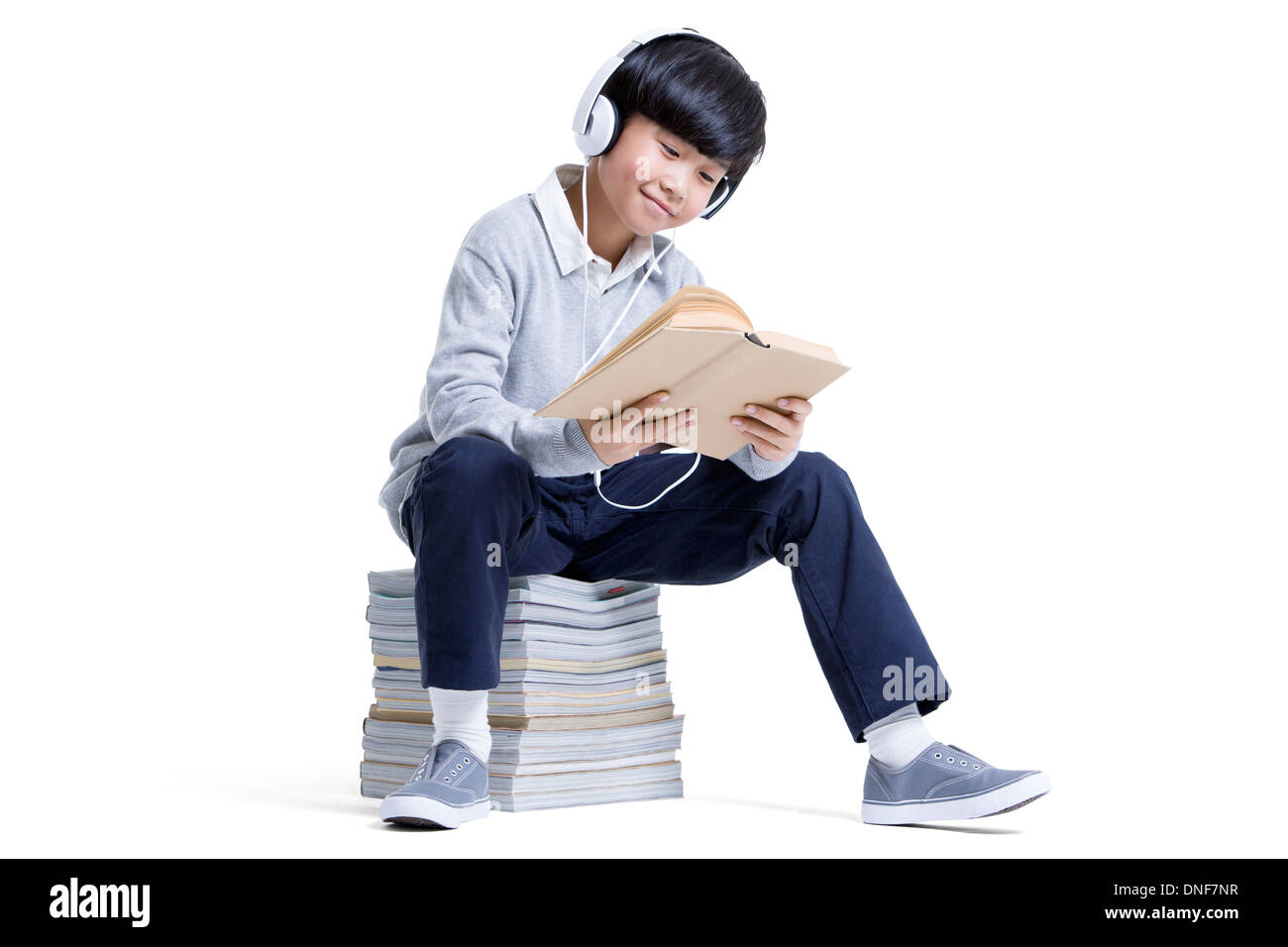 One boy reading Cut Out Stock Images & Pictures - Alamy