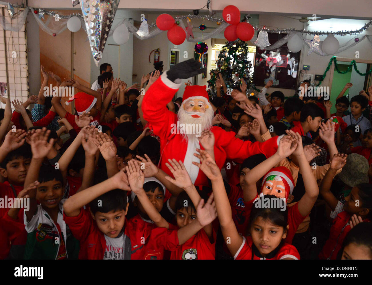 Hyderabad, India. 24th Dec, 2013. Children sing on Christmas Eve in ...