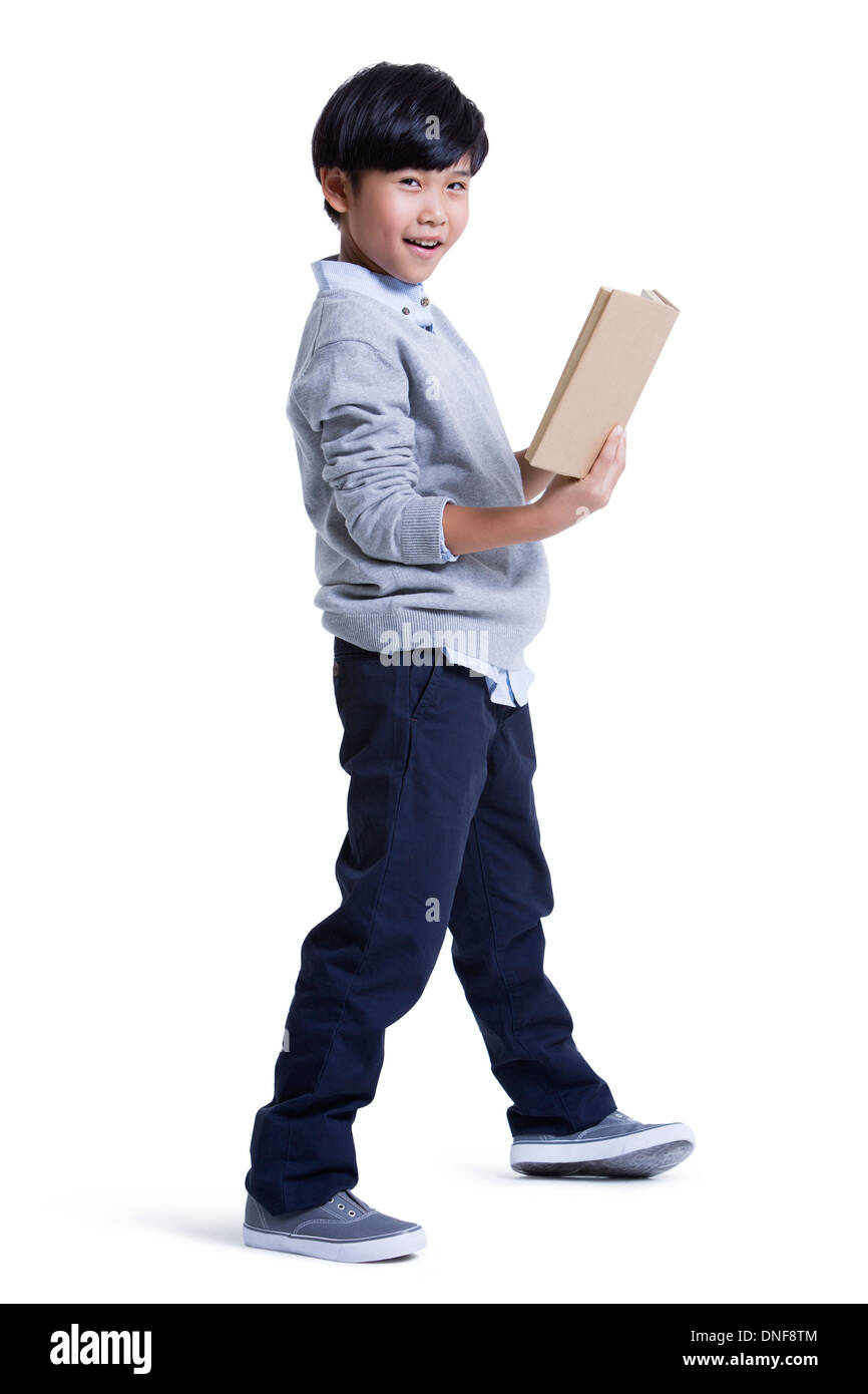 Cute boy reading Stock Photo - Alamy