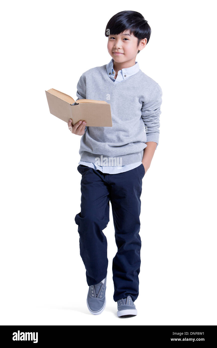 Cute boy reading Stock Photo - Alamy