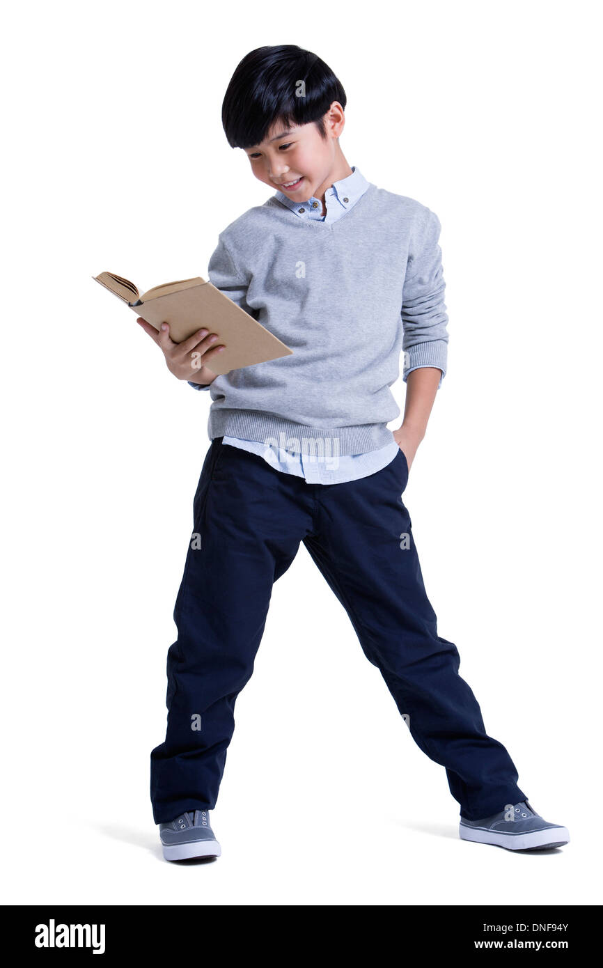 Asian child reading back view Cut Out Stock Images & Pictures - Alamy