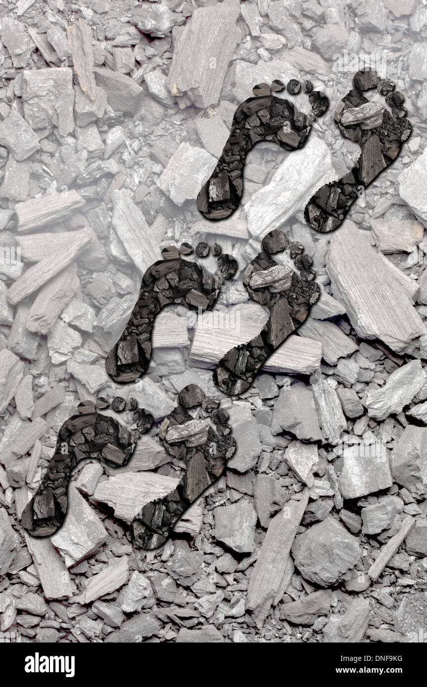Footprints on coal dust Stock Photo - Alamy