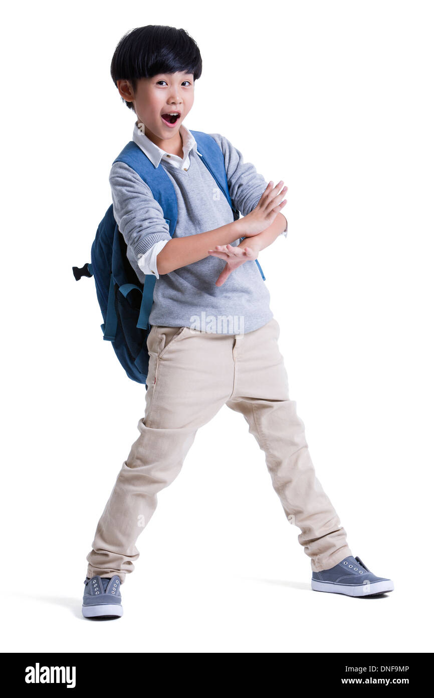 Cool boy with schoolbag on back Stock Photo - Alamy
