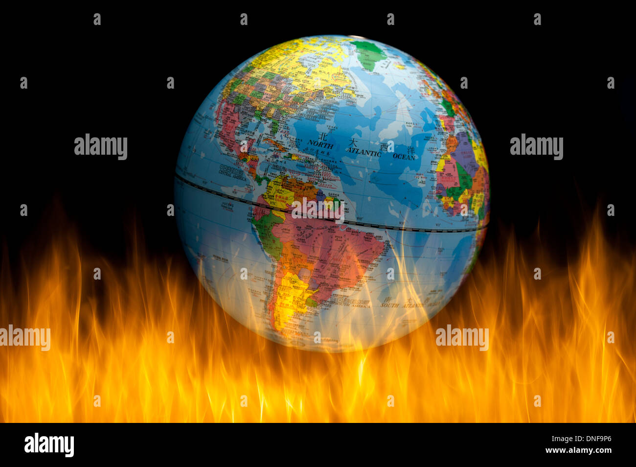 Globe on fire Stock Photo - Alamy