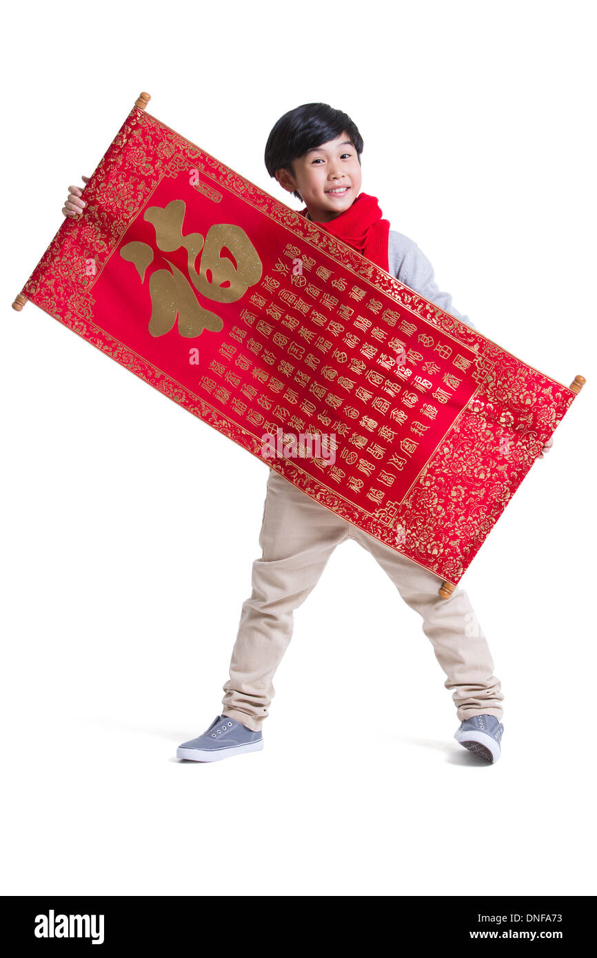 Happy boy celebrating Chinese New Year Stock Photo - Alamy