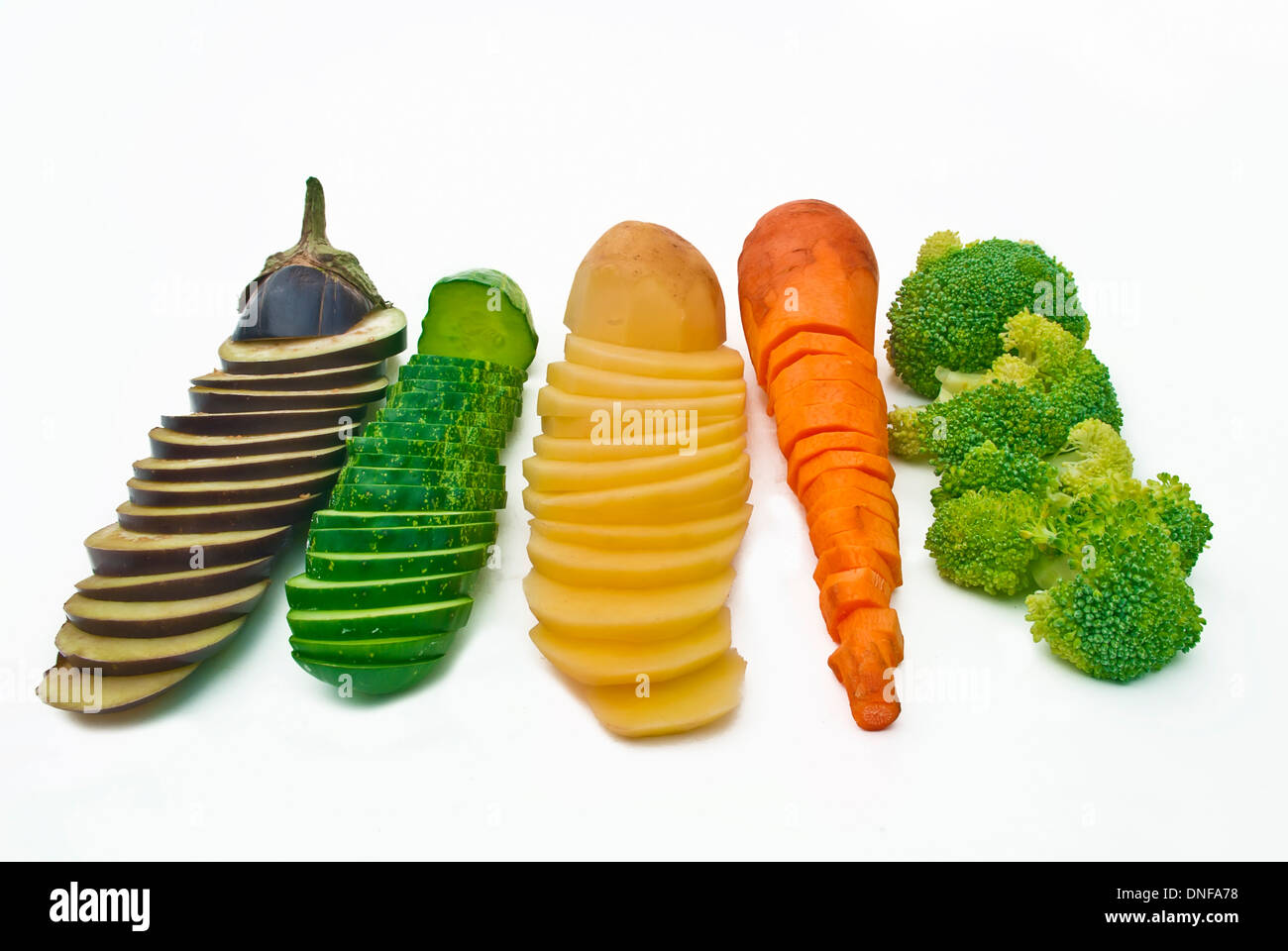 Five sliced vegetables isolted on white Stock Photo - Alamy