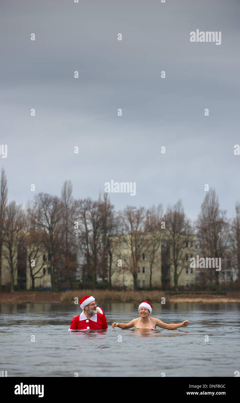 Berlin, Germany. 25th Dec, 2013. Members of the "Berlin Seals" swim in ...