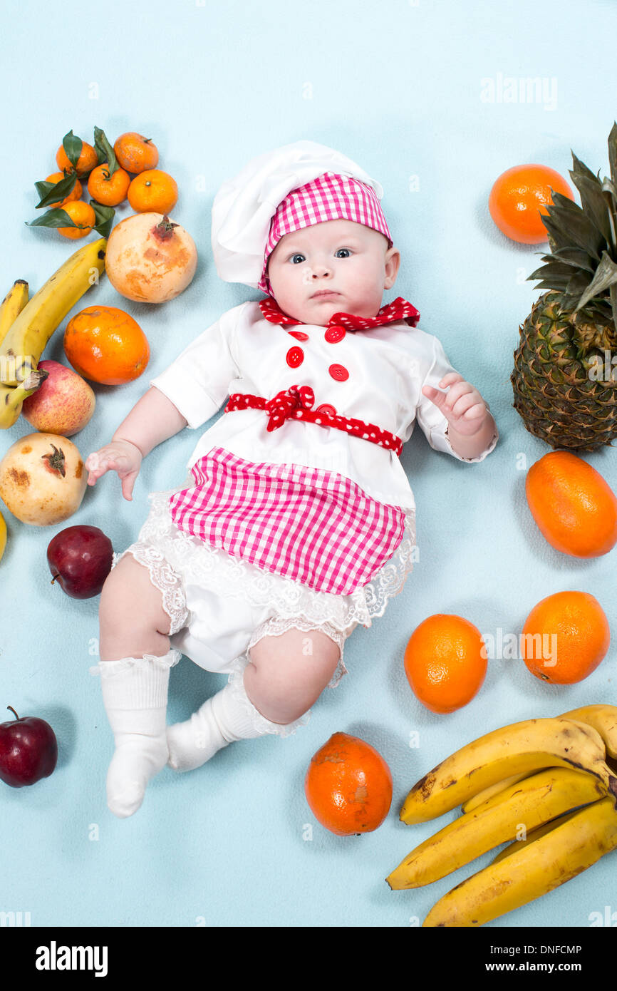 Baby cook girl wearing chef hat with fresBaby cook girl wearing chef ...