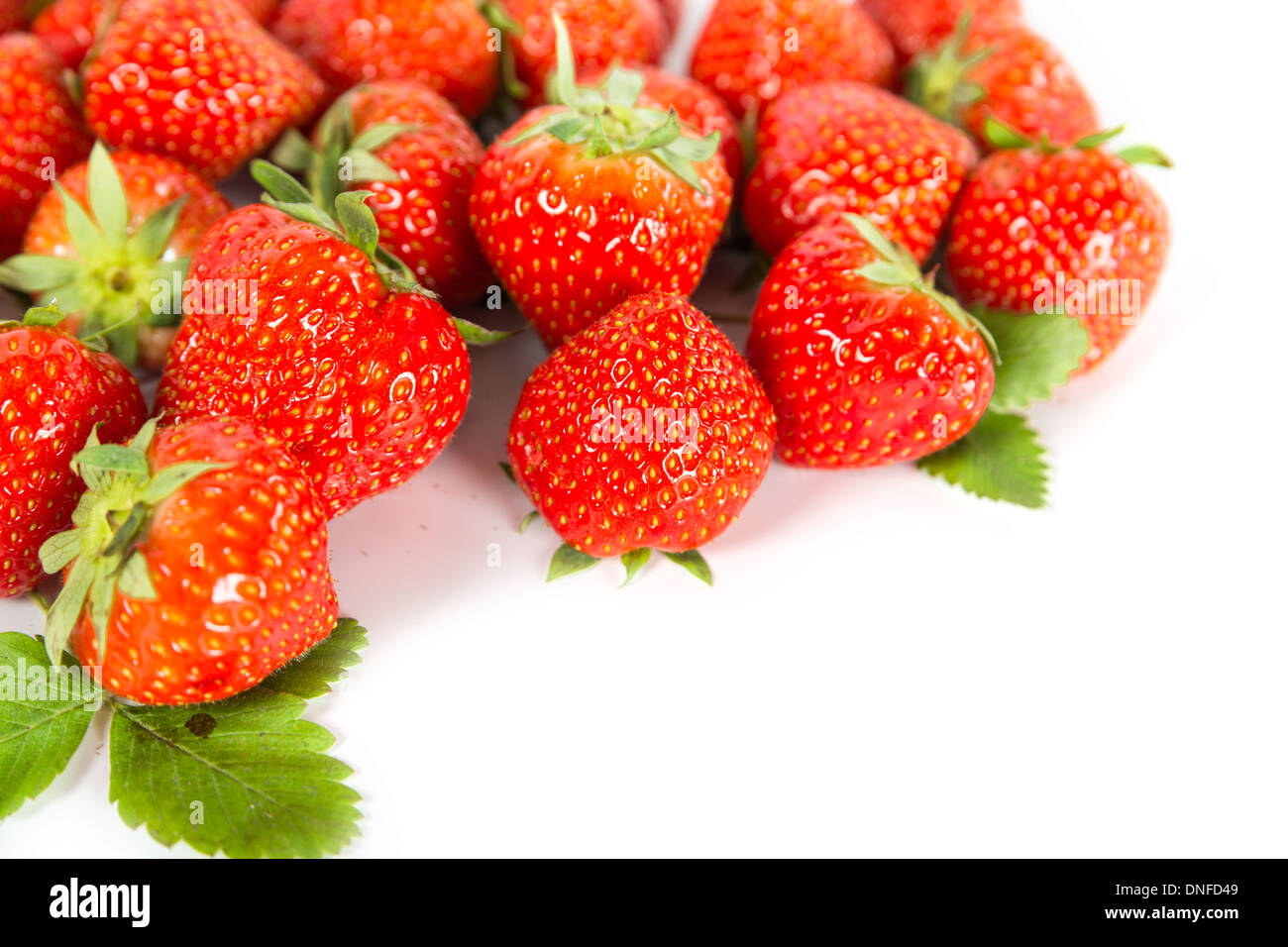 Strawberries on white Stock Photo - Alamy