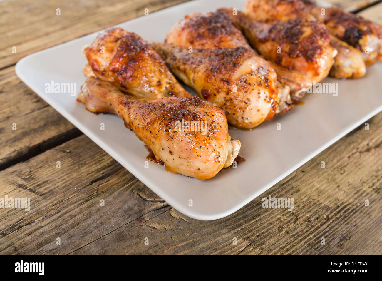 Roasted chicken legs Stock Photo - Alamy