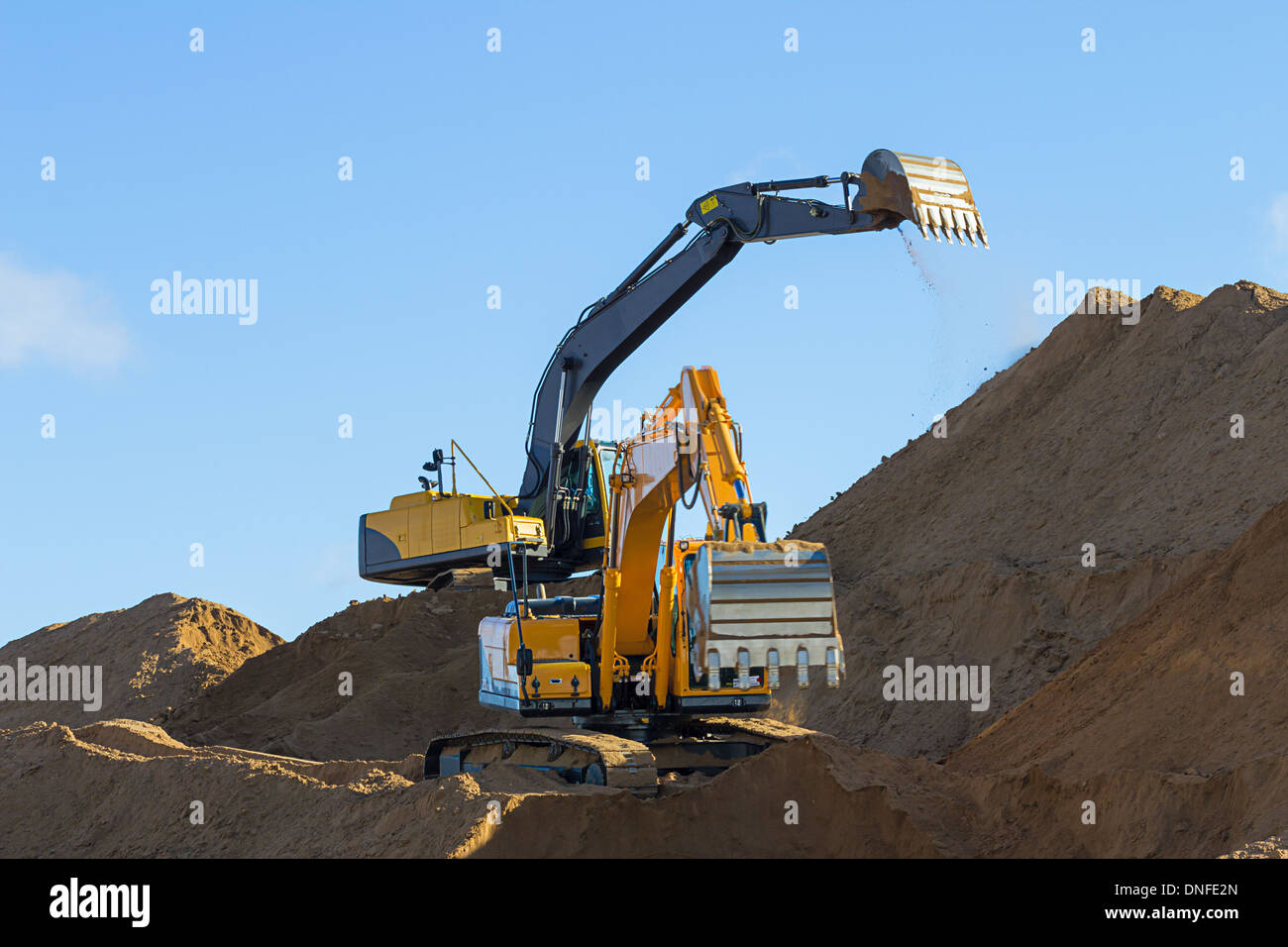 Yellow construction transport Stock Photo - Alamy