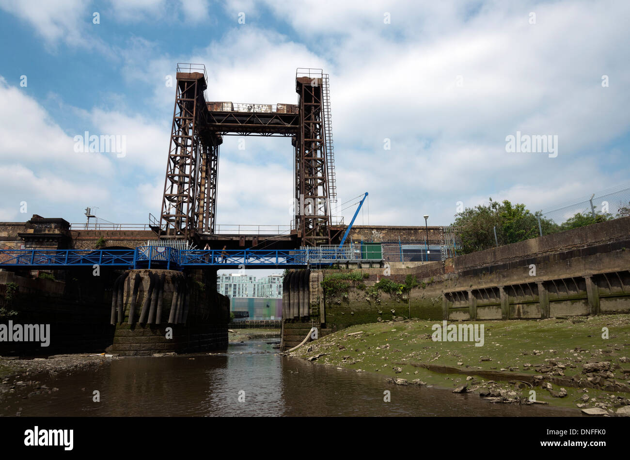 Ha'penny foot bridge against the lifting bridge over the River ...