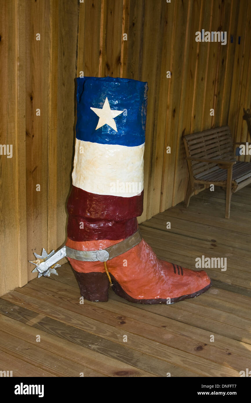 Texas boot sculpture at Heritage Village in East Texas Stock Photo - Alamy