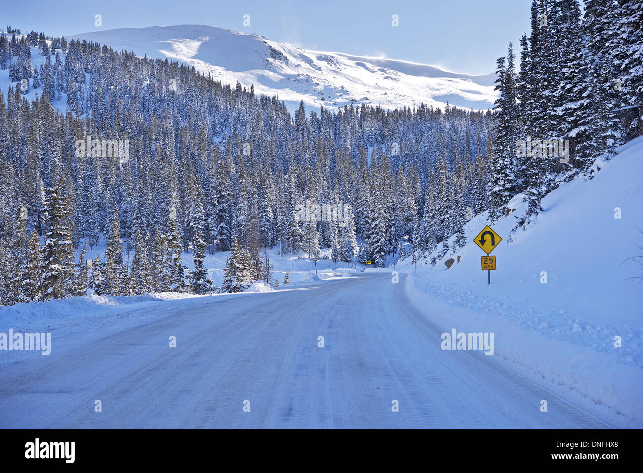 Mountain road in snowy hi-res stock photography and images - Alamy