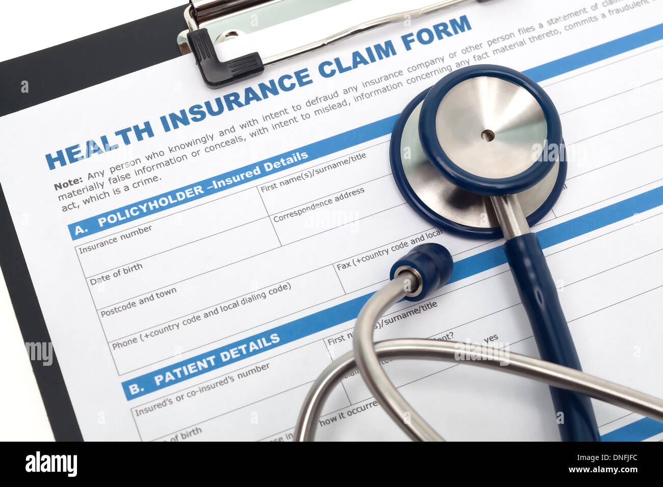 Medical and health insurance claim form with stethoscope on clipboard ...