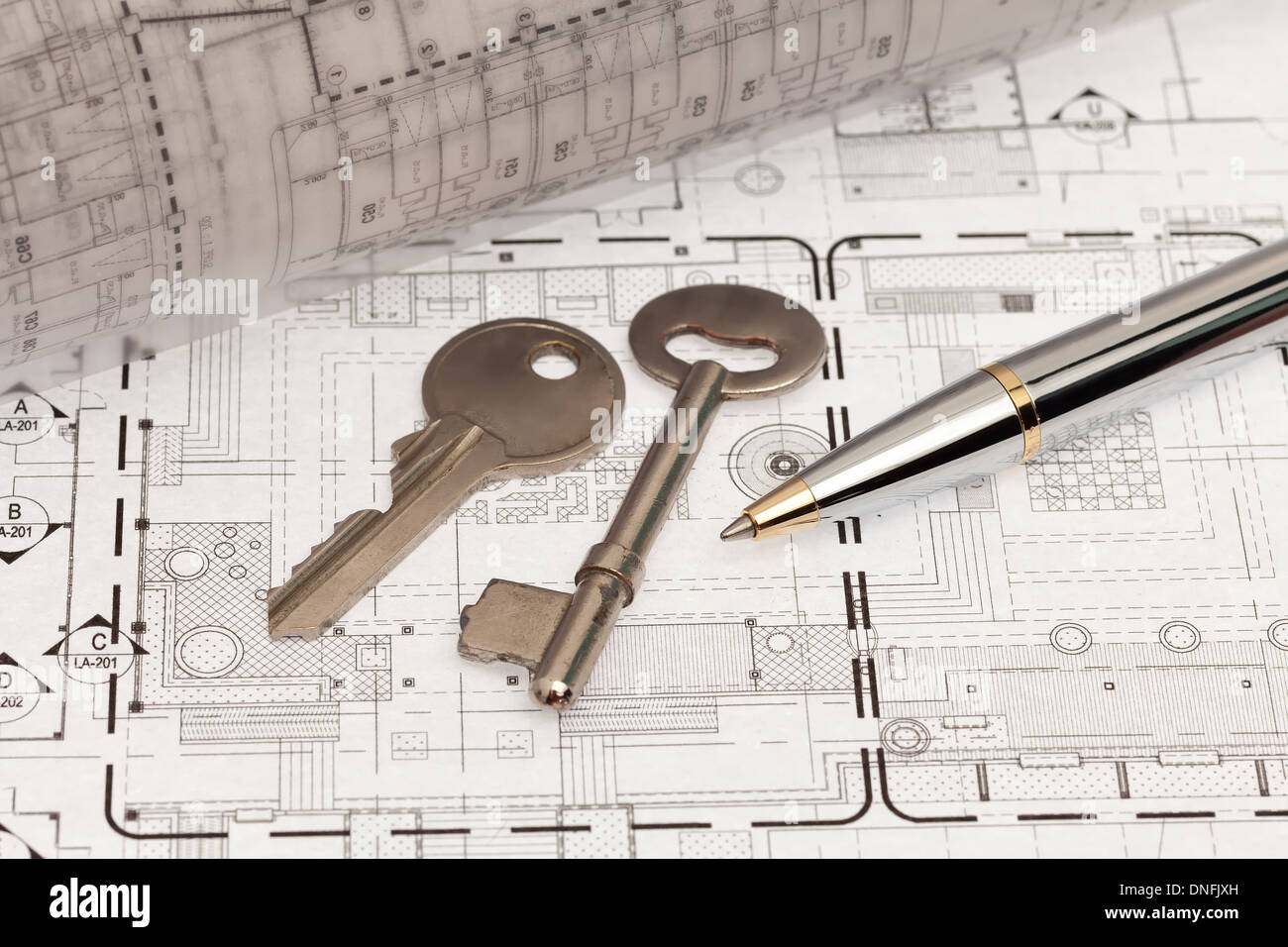 Architecture work with blueprint and key Stock Photo - Alamy